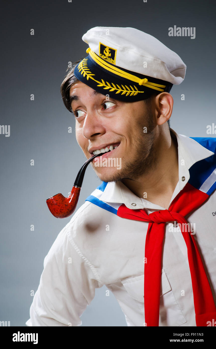 Funny captain sailor wearing hat Stock Photo - Alamy