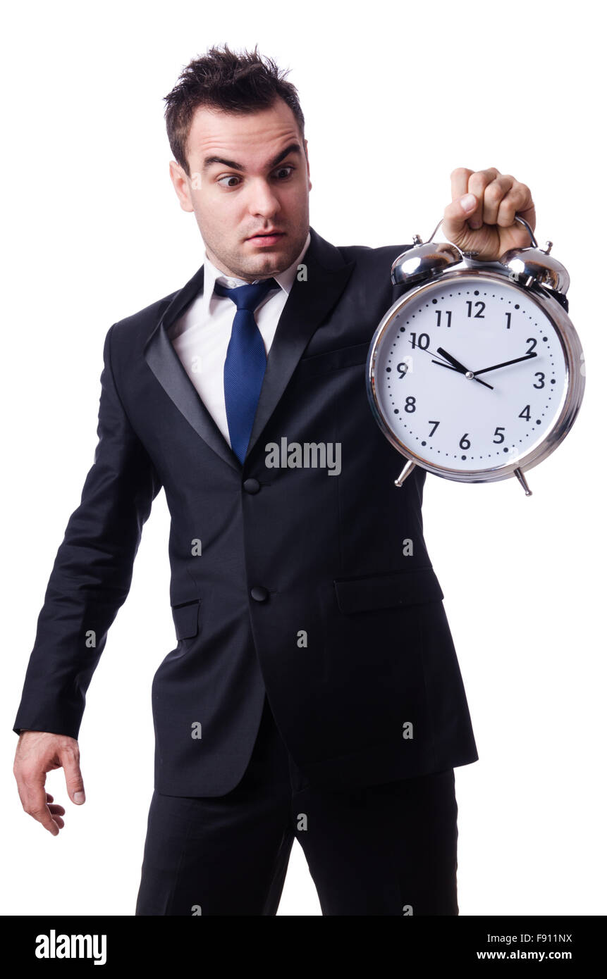 Man with alarm clock isolated on white Stock Photo - Alamy