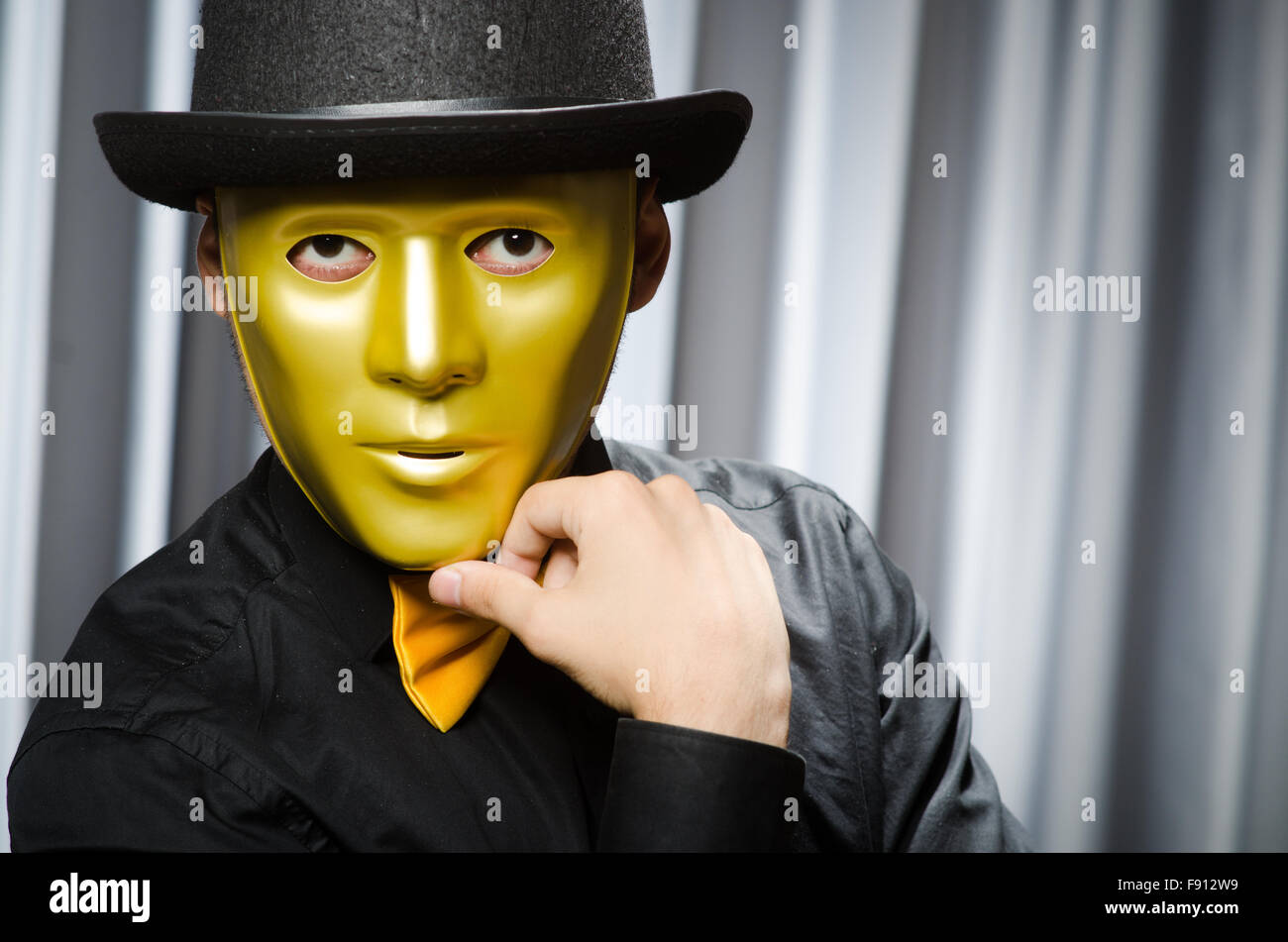 Funny concept with theatrical mask Stock Photo - Alamy