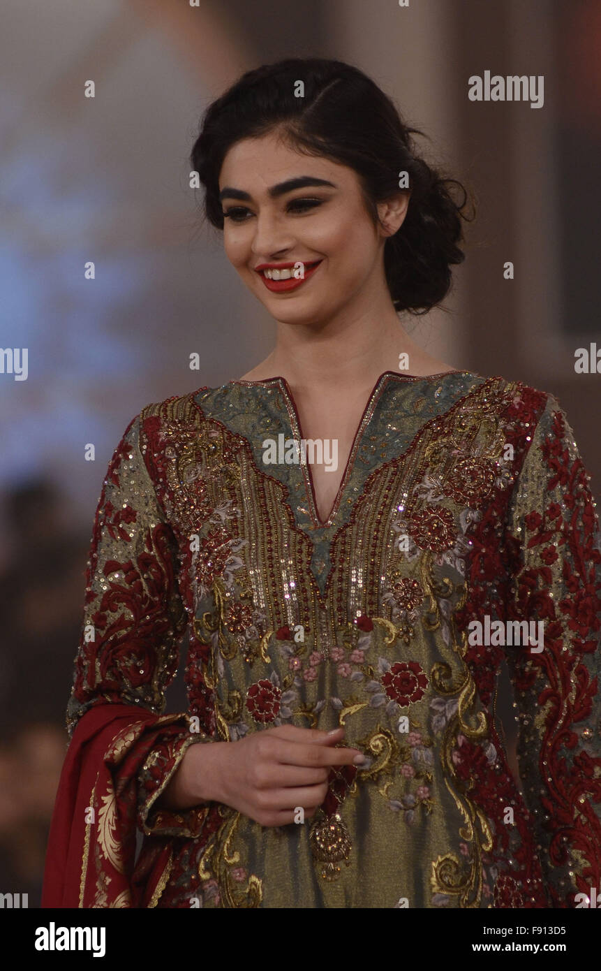 Lahore, Pakistan. 12th Dec, 2015. Pakistani model presents creations of ...