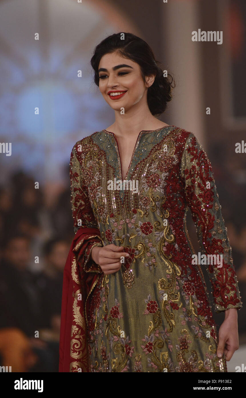Lahore, Pakistan. 12th Dec, 2015. Pakistani model presents creations of ...