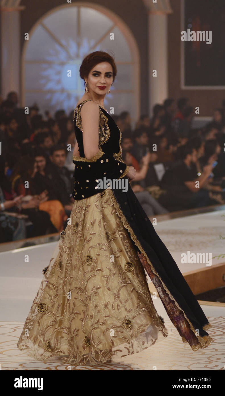 Lahore, Pakistan. 12th Dec, 2015. Pakistani model presents creations of ...