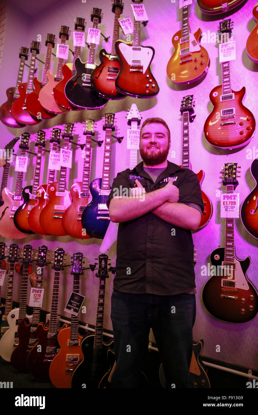 CARDIFF, WALES. Staff at Proffesional Music Technology store stood ...