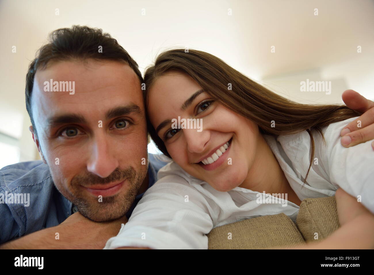 romantic happy young couple relax at modern home indoors Stock Photo ...