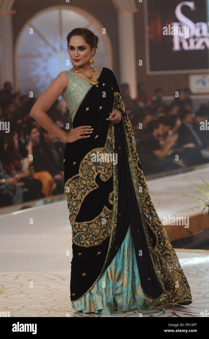 Lahore, Pakistan. 12th Dec, 2015. Pakistani model presents creations of ...
