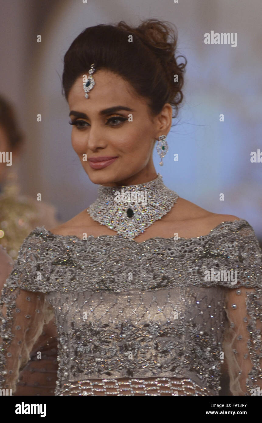 Lahore, Pakistan. 12th Dec, 2015. Pakistani model presents creations of ...