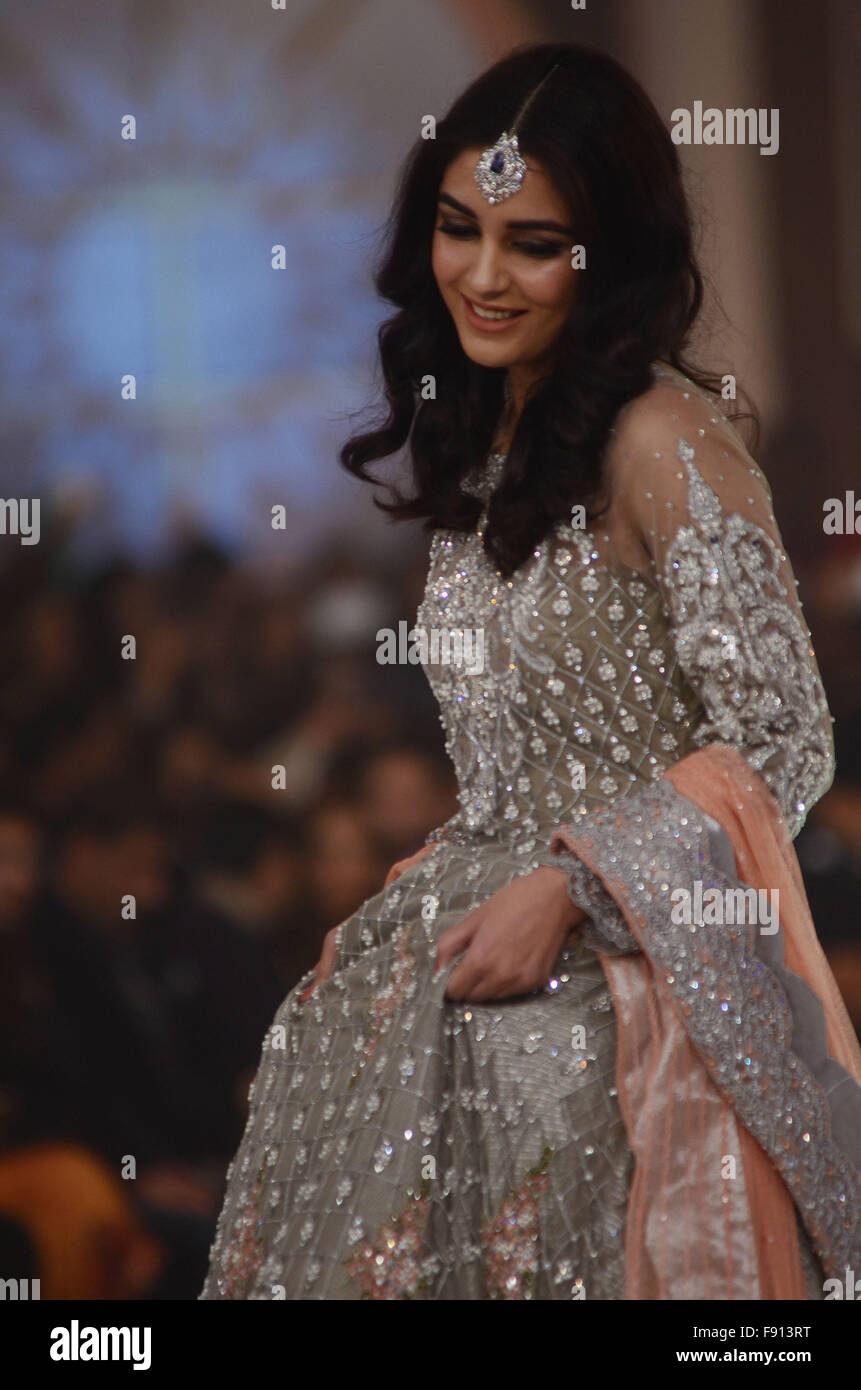 Lahore, Pakistan. 12th Dec, 2015. Pakistani model presents creations of ...