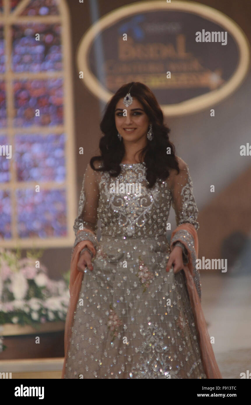 Lahore, Pakistan. 12th Dec, 2015. Pakistani model presents creations of ...