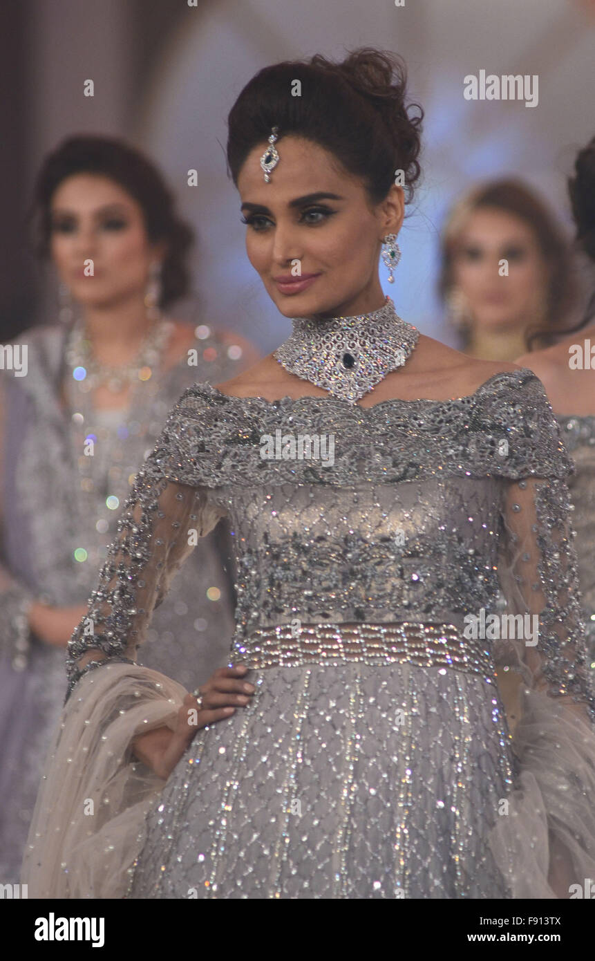 Lahore, Pakistan. 12th Dec, 2015. Pakistani model presents creations of ...