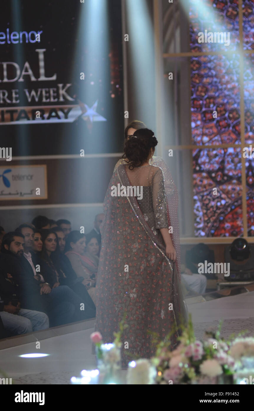 Lahore, Pakistan. 12th Dec, 2015. Pakistani model presents creations of ...
