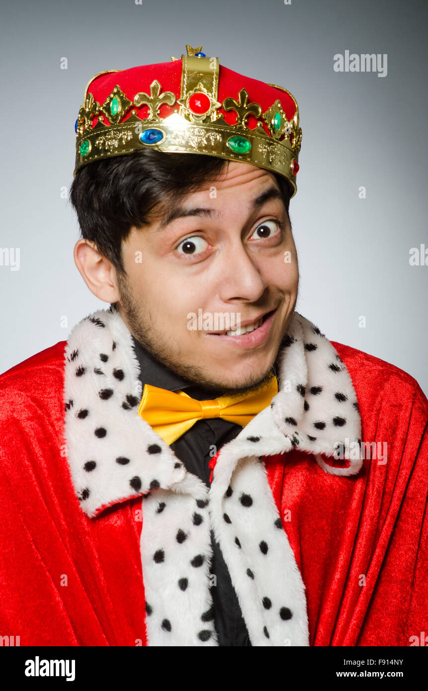 Concept with funny man wearing crown Stock Photo - Alamy