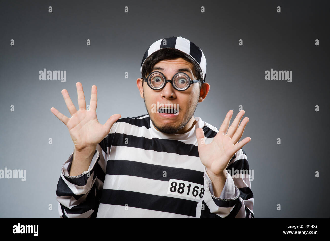Prison inmate in funny concept Stock Photo - Alamy