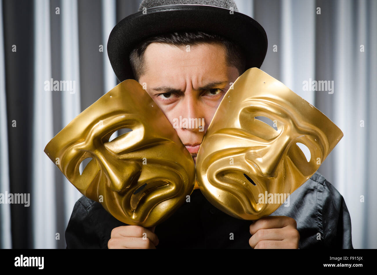 Funny concept with theatrical mask Stock Photo - Alamy