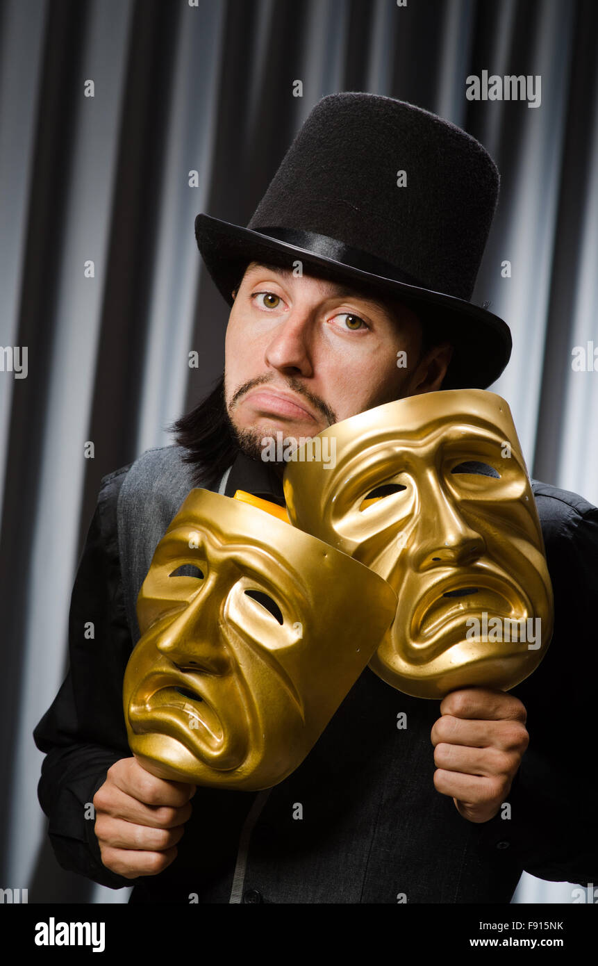 Funny concept with theatrical mask Stock Photo - Alamy