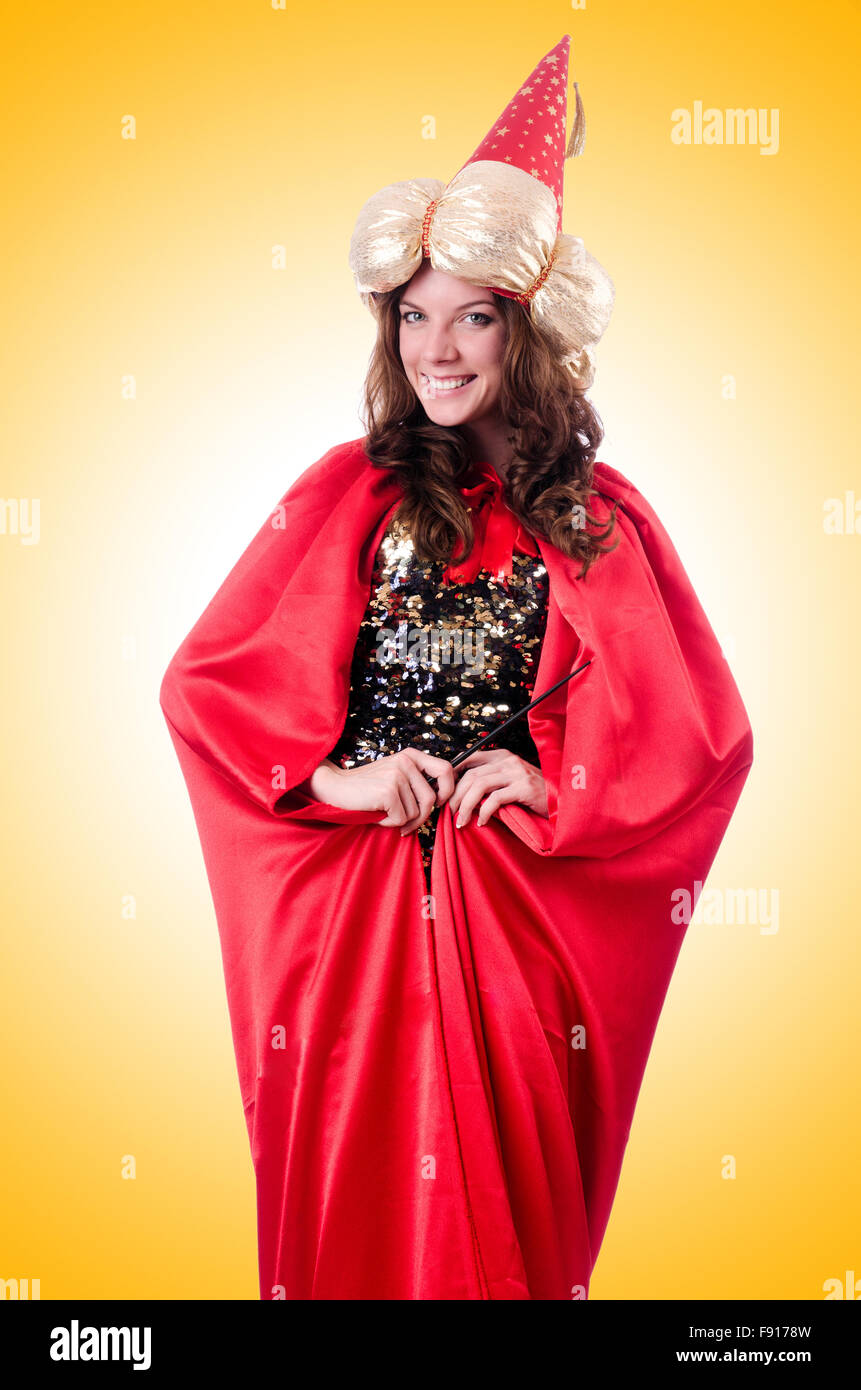 Female magician isolated on white Stock Photo - Alamy