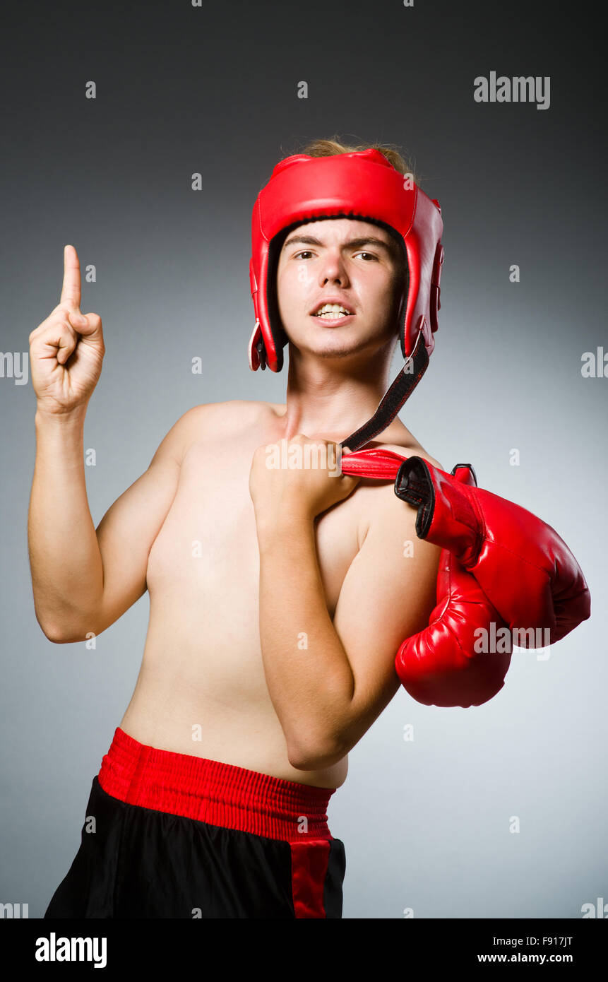 Funny boxer against dark background Stock Photo - Alamy