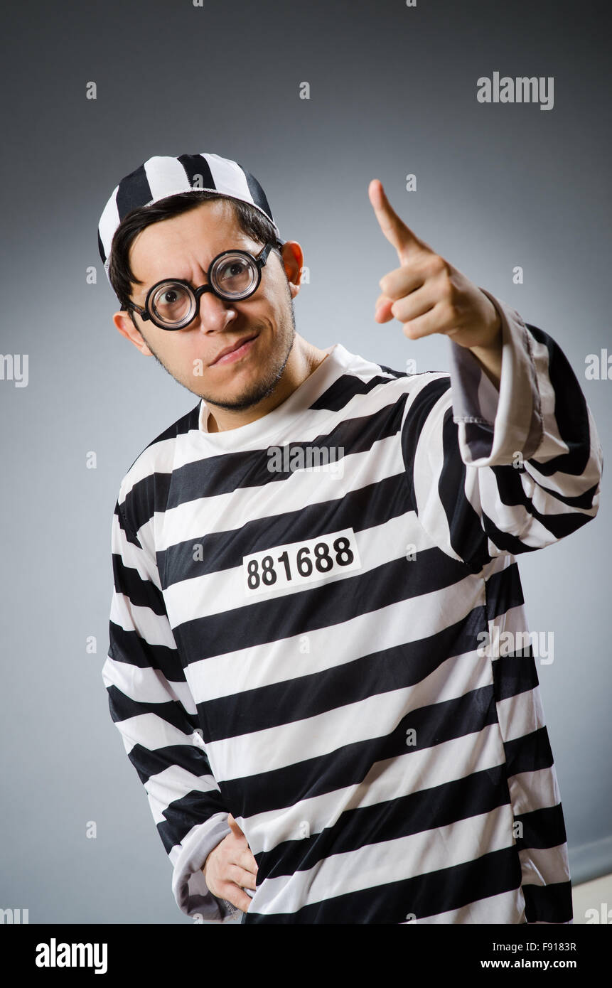 Prison inmate in funny concept Stock Photo - Alamy