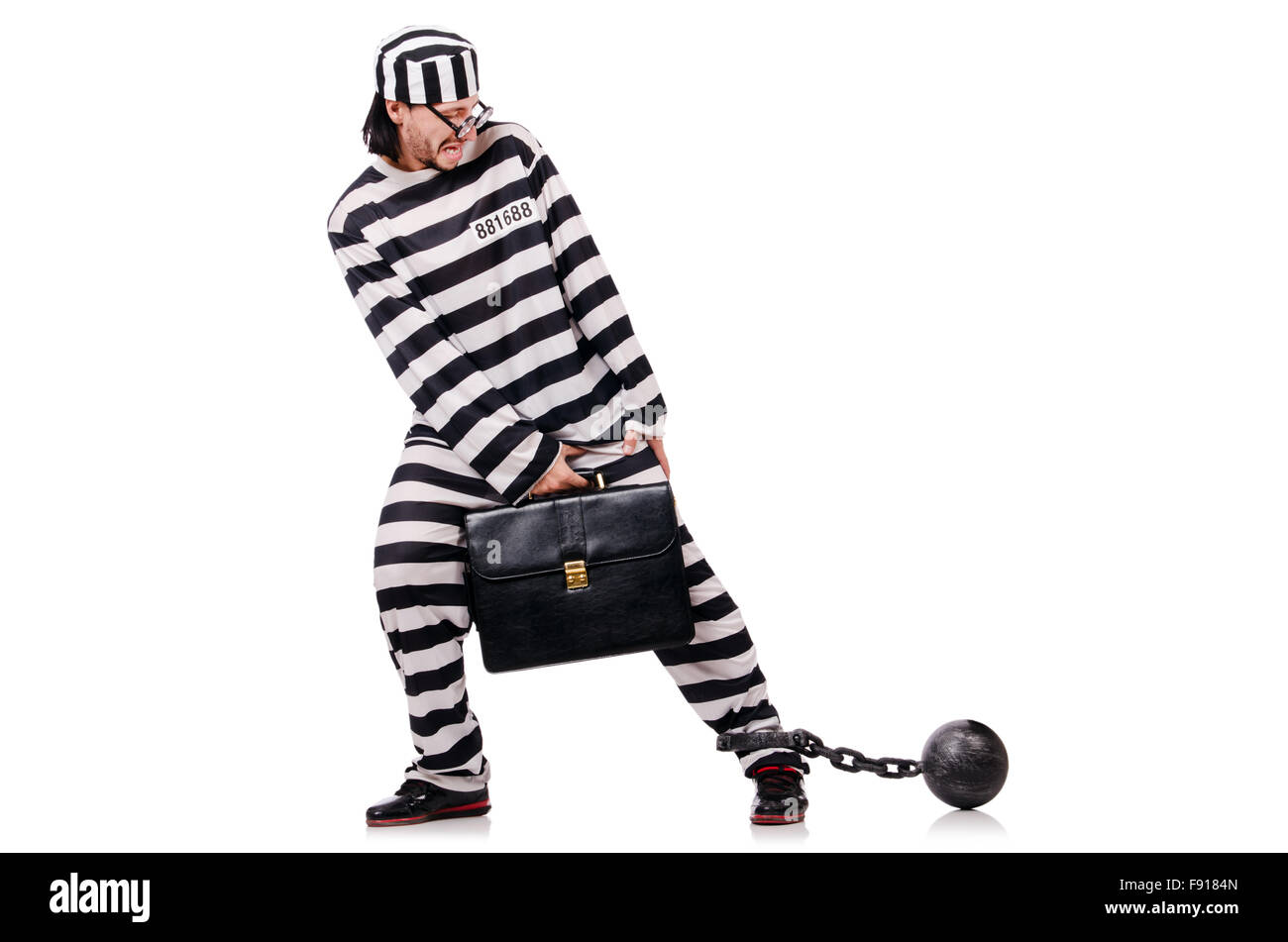 Funny prisoner with briefcase and shackles isolated on white Stock ...