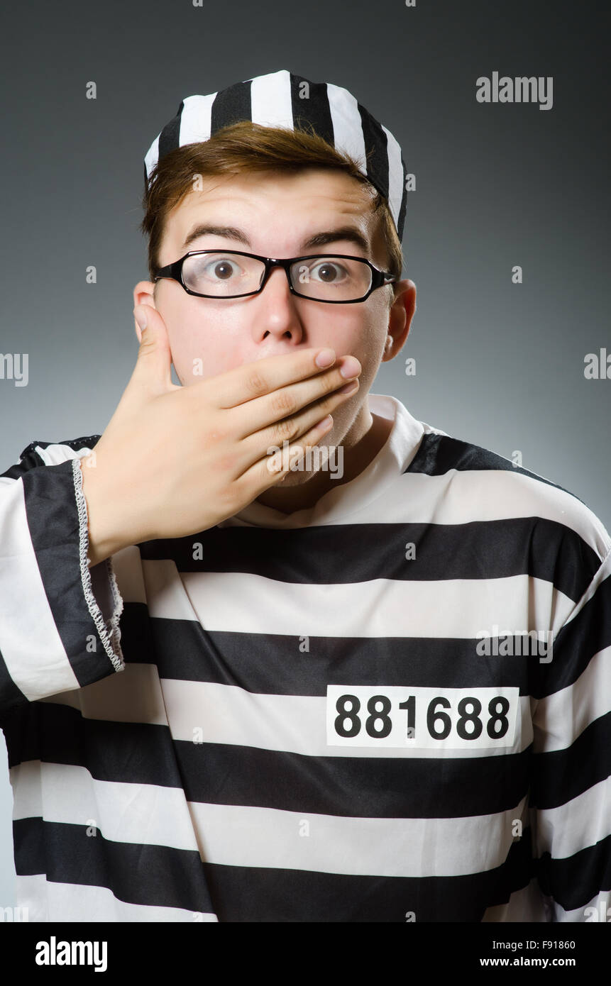 Prison inmate in funny concept Stock Photo - Alamy