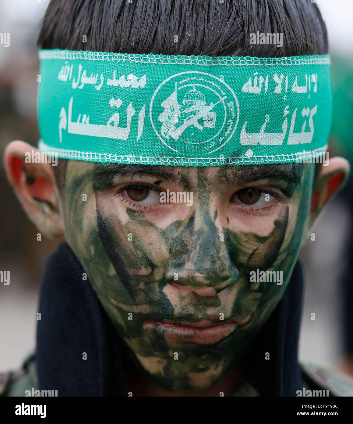 Gaza, Palestine. 11th Dec, 2015. Young boy with painted face during the ...