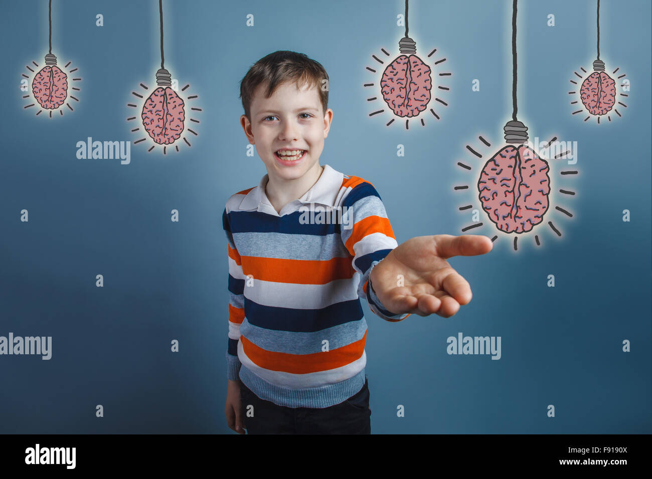 adolescent boy laughing and held out his hand forward gesture of Stock ...