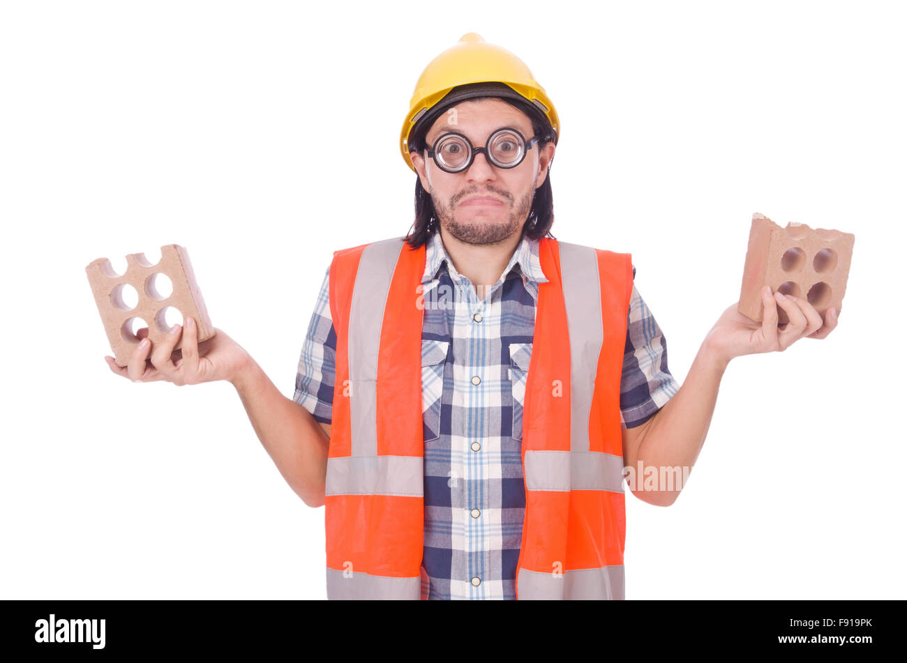 Funny young construction worker with broken brick isolated on white ...