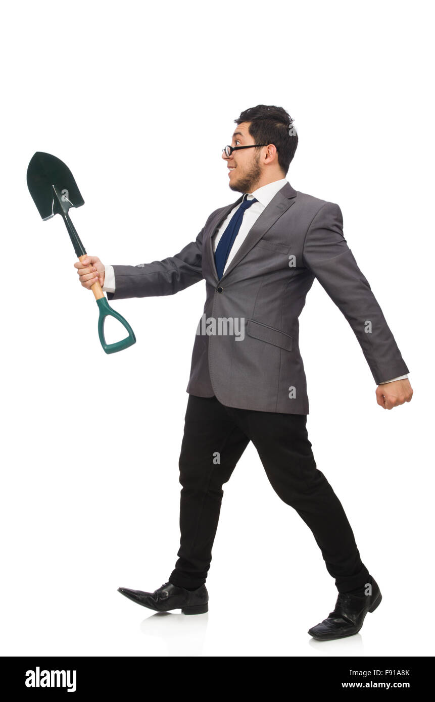 Young businessman holding a spade isolated on white Stock Photo - Alamy