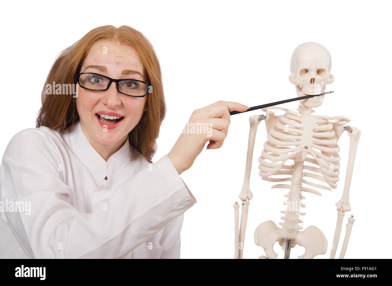 Young female doctor with skeleton isolated on white Stock Photo - Alamy