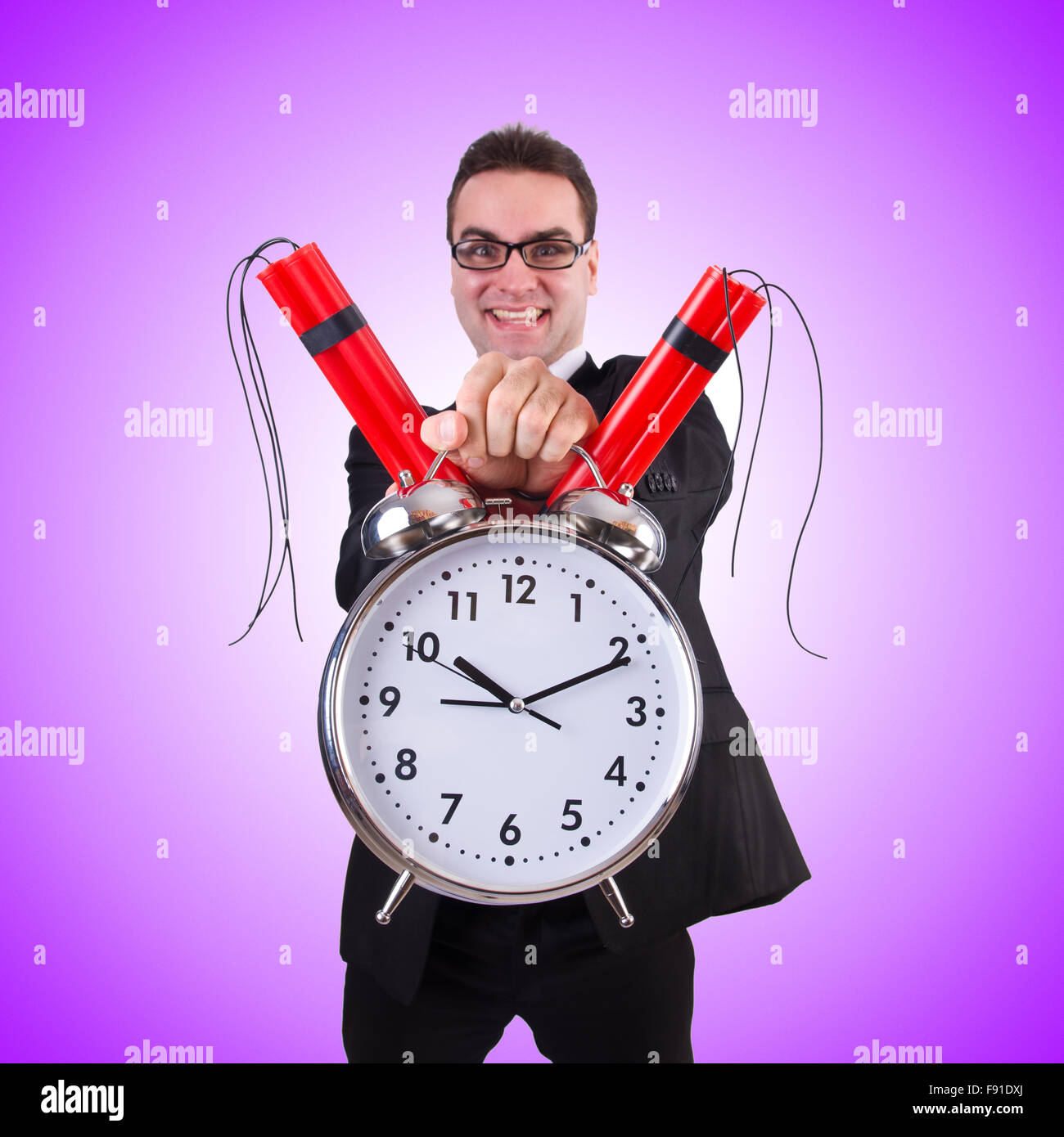 Man with time bomb against the gradient Stock Photo - Alamy