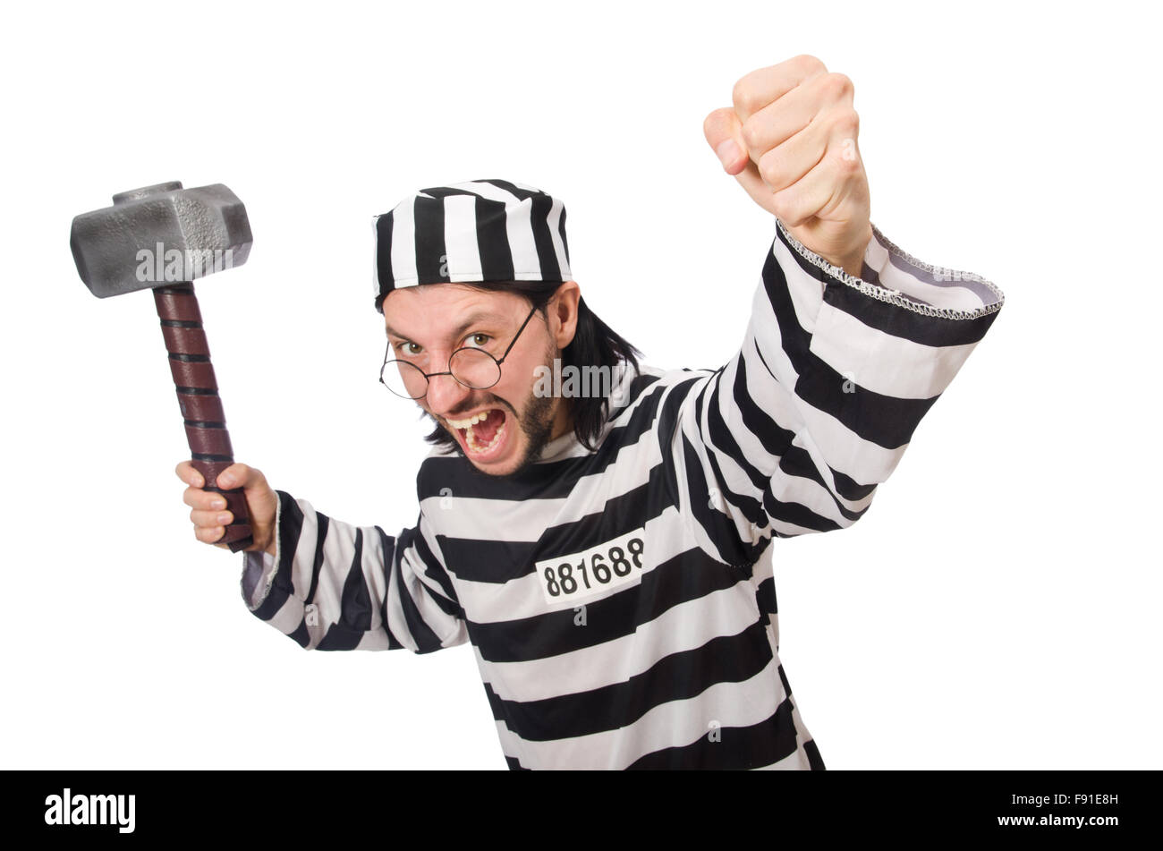 Prison inmate with hammer isolated on white Stock Photo - Alamy