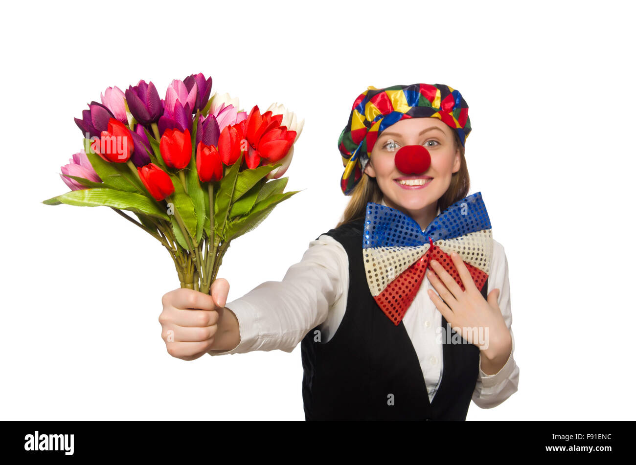 Pretty female clown with flowers isolated on white Stock Photo - Alamy