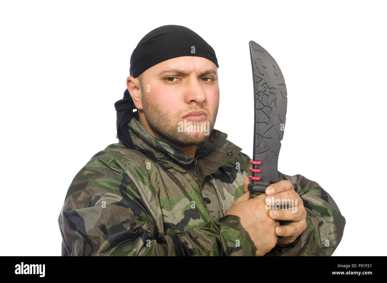 Young man in soldier uniform holding knife isolated on white Stock ...