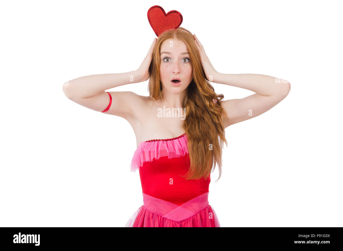 Pretty young model in mini pink dress isolated on white Stock Photo - Alamy
