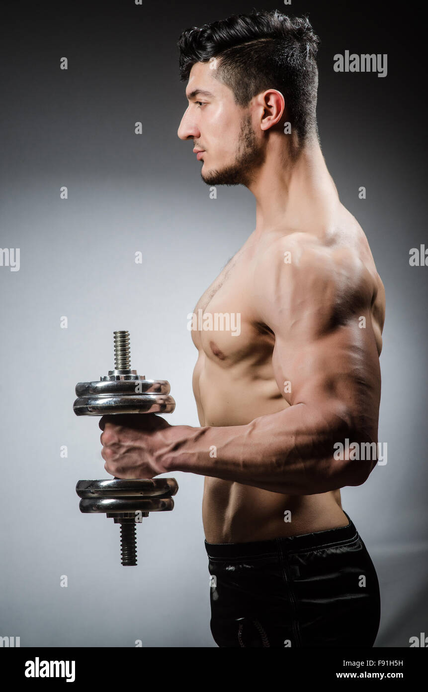 Muscular ripped bodybuilder dumbbells hi-res stock photography and ...