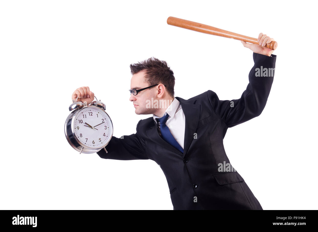 Man hitting the clock with baseball bat isolated on the white Stock ...