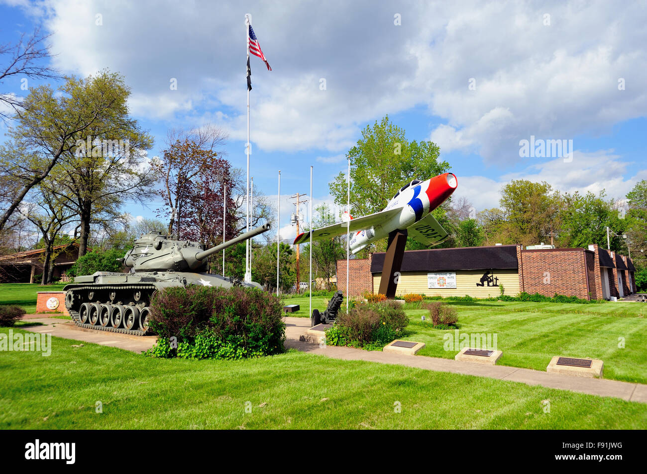 A M47 Patton tank and Korean War-era vintage F-84F jet fighter on ...