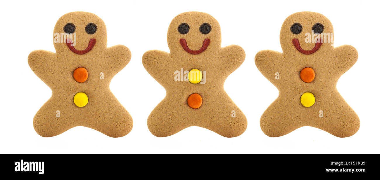 Three Gingerbread Men on a White Background Stock Photo - Alamy