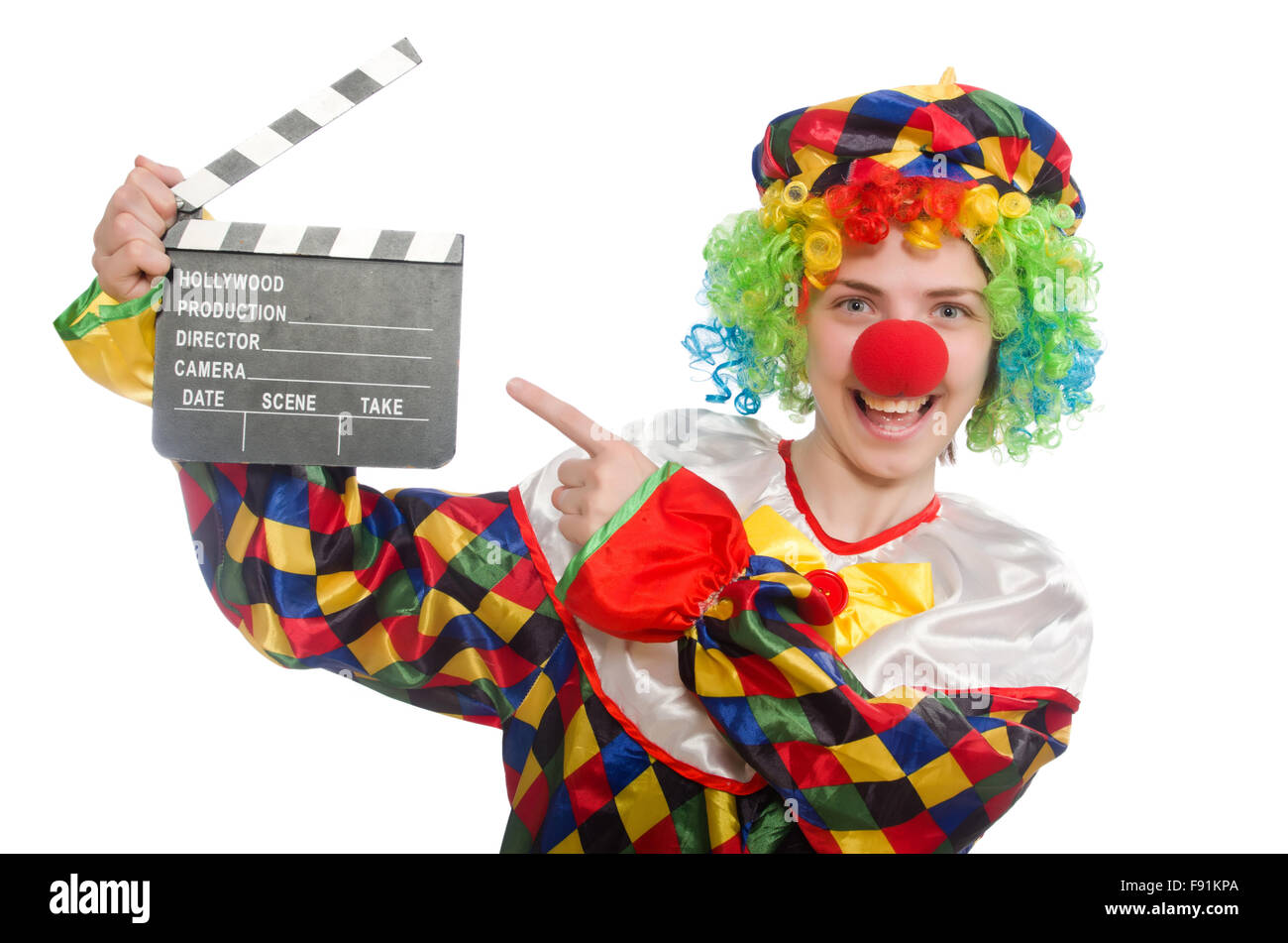 Clown with movie clapper isolated on white Stock Photo - Alamy