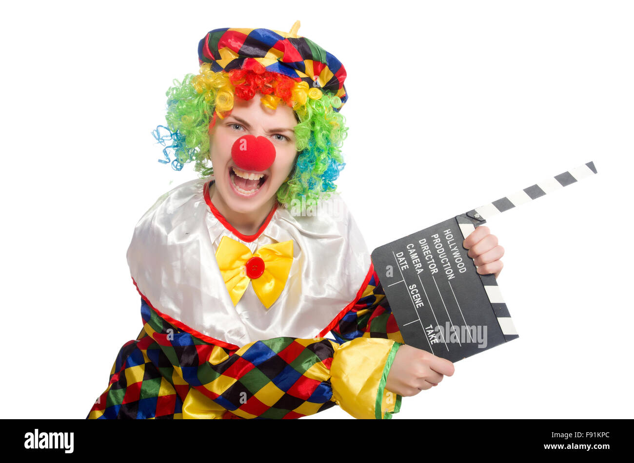 Clown with movie clapper isolated on white Stock Photo - Alamy