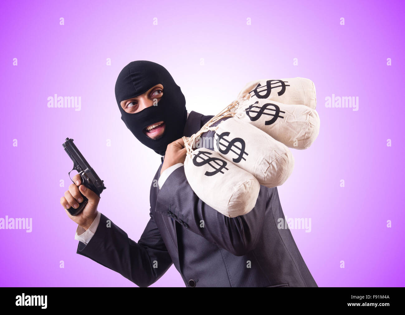 Gangster with bags of money against the gradient Stock Photo - Alamy