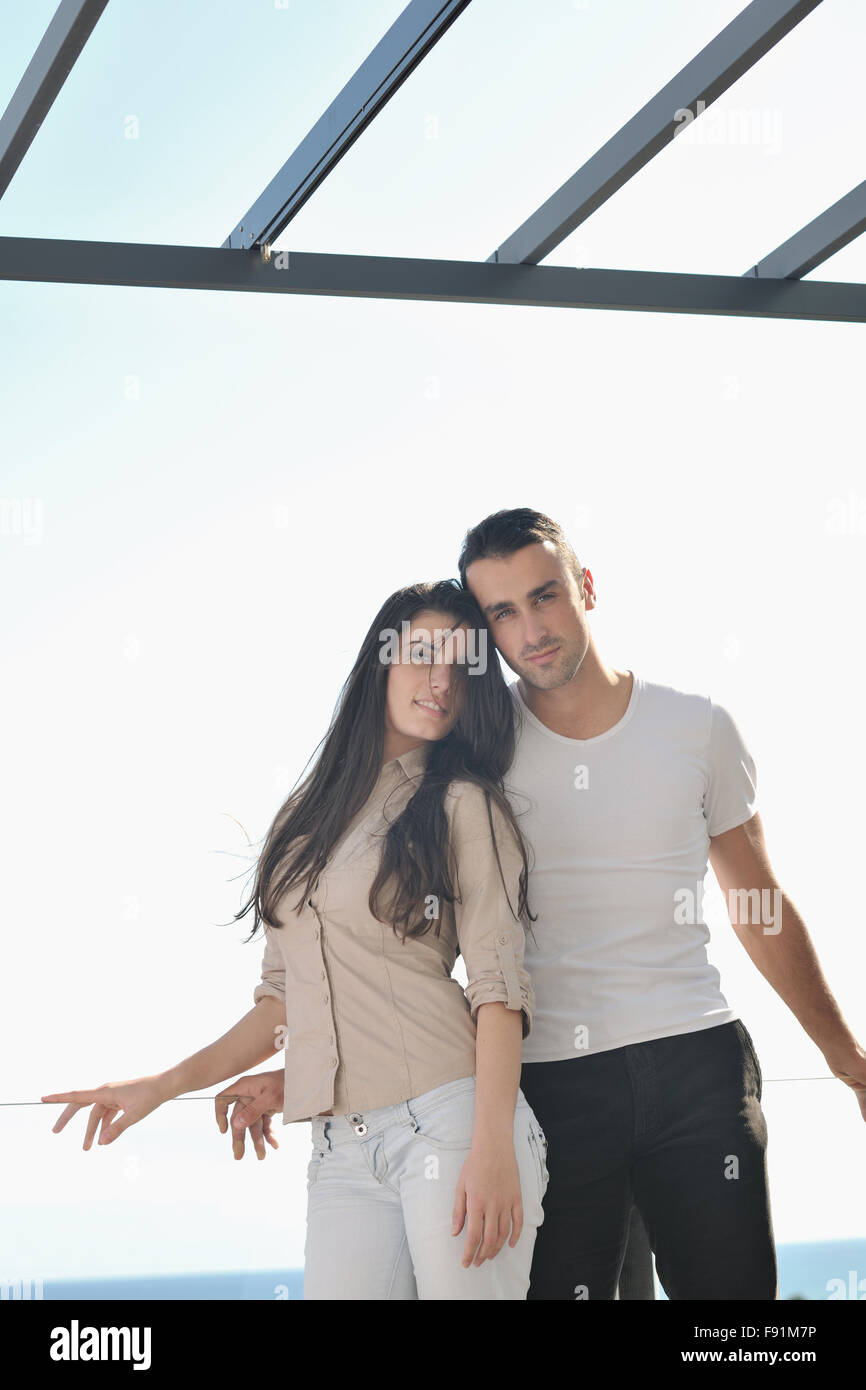 happy young couple in love have romance relax on balcony outdoor with ...