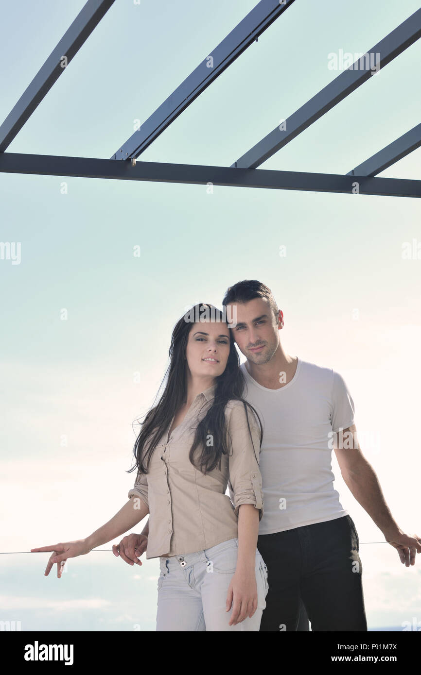 happy young couple in love have romance relax on balcony outdoor with ...