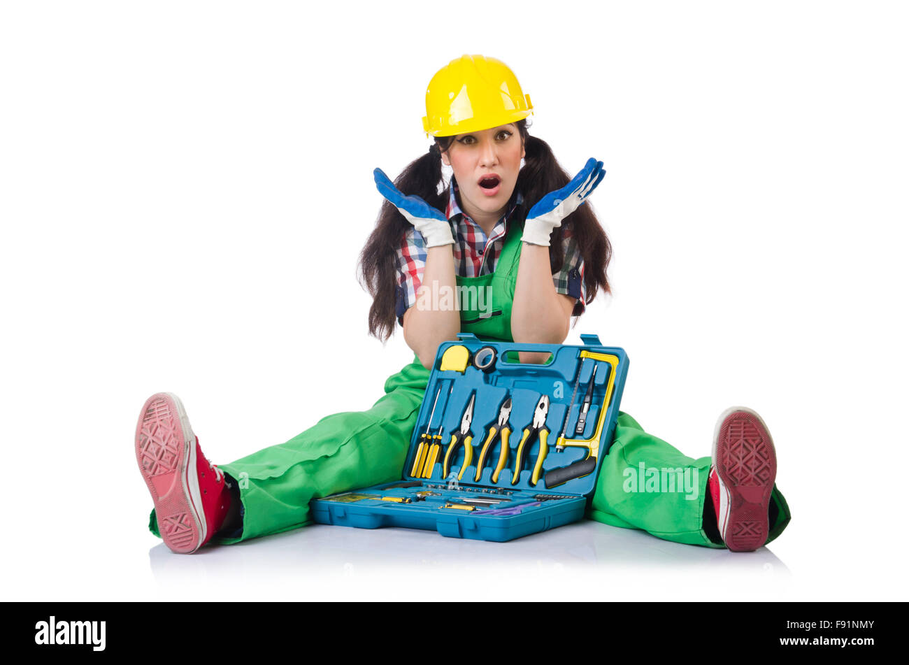 Female workman in green overalls with tool kit isolated on white Stock ...
