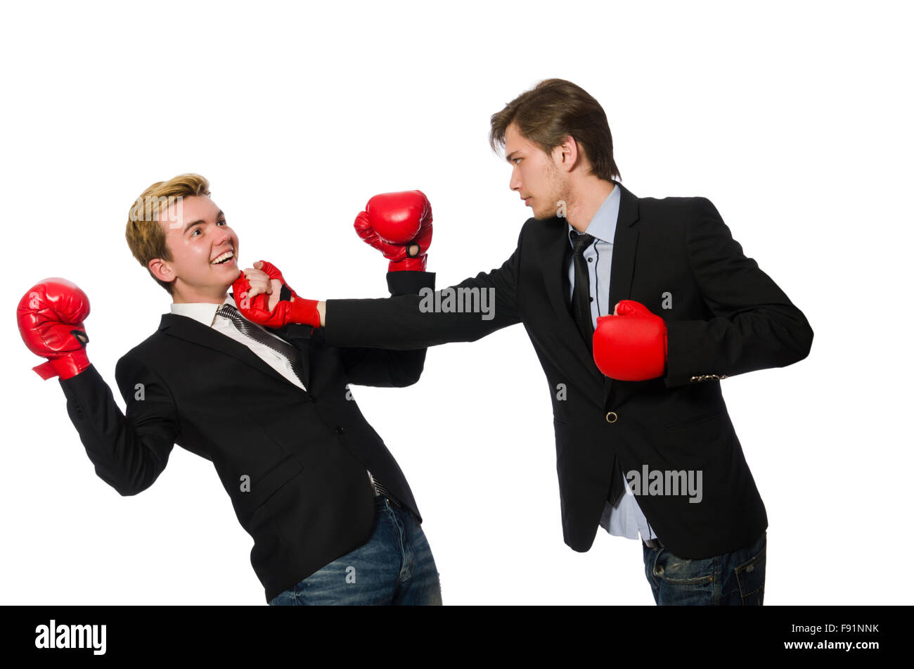 Pair of businessmen boxing on white Stock Photo - Alamy