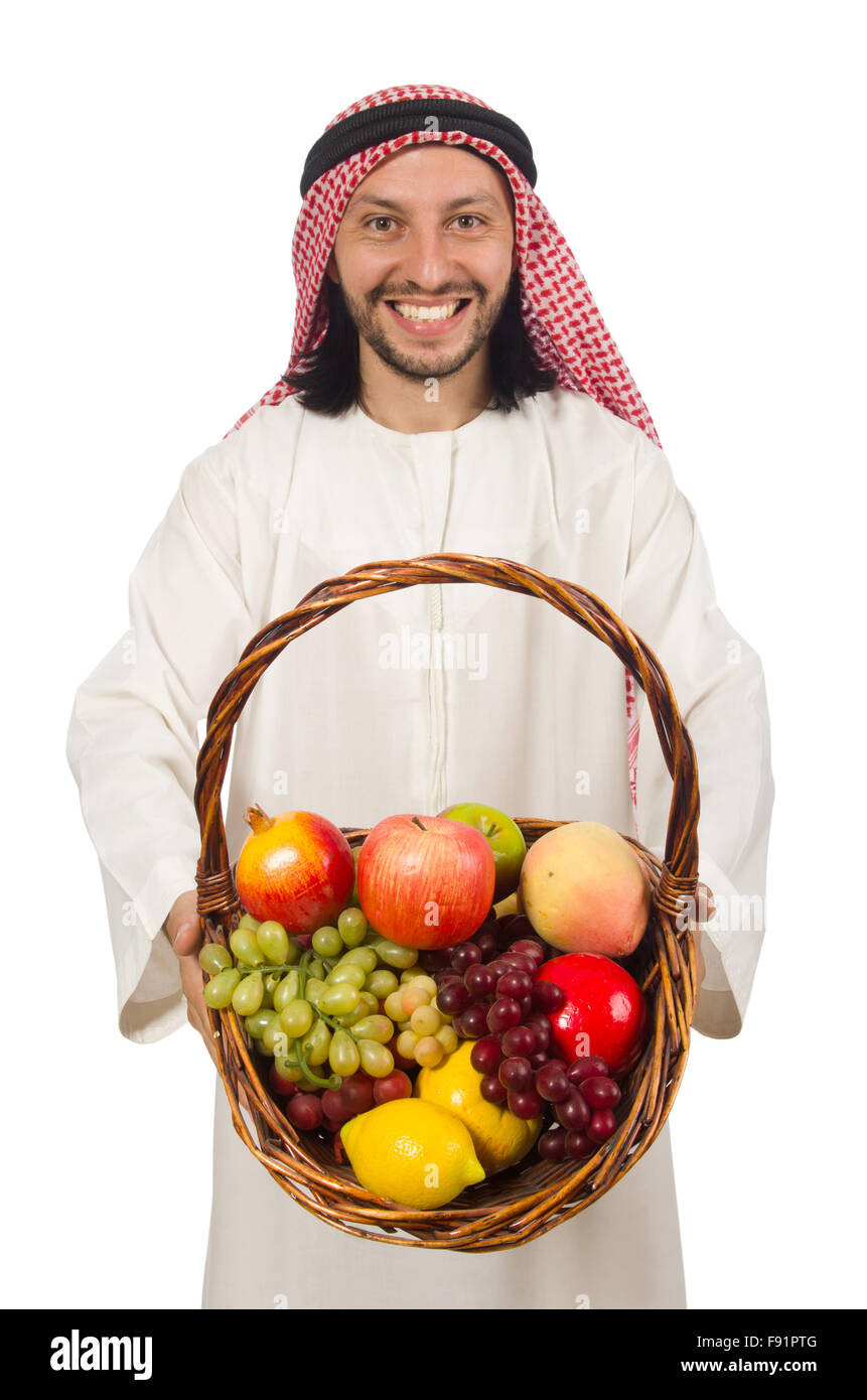 Arab man with fruits isolated on white Stock Photo - Alamy