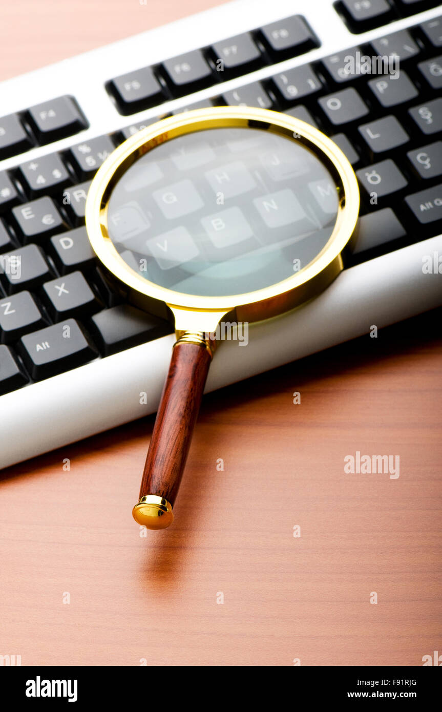 Computer security concept with keyboard and magnifying glass Stock ...