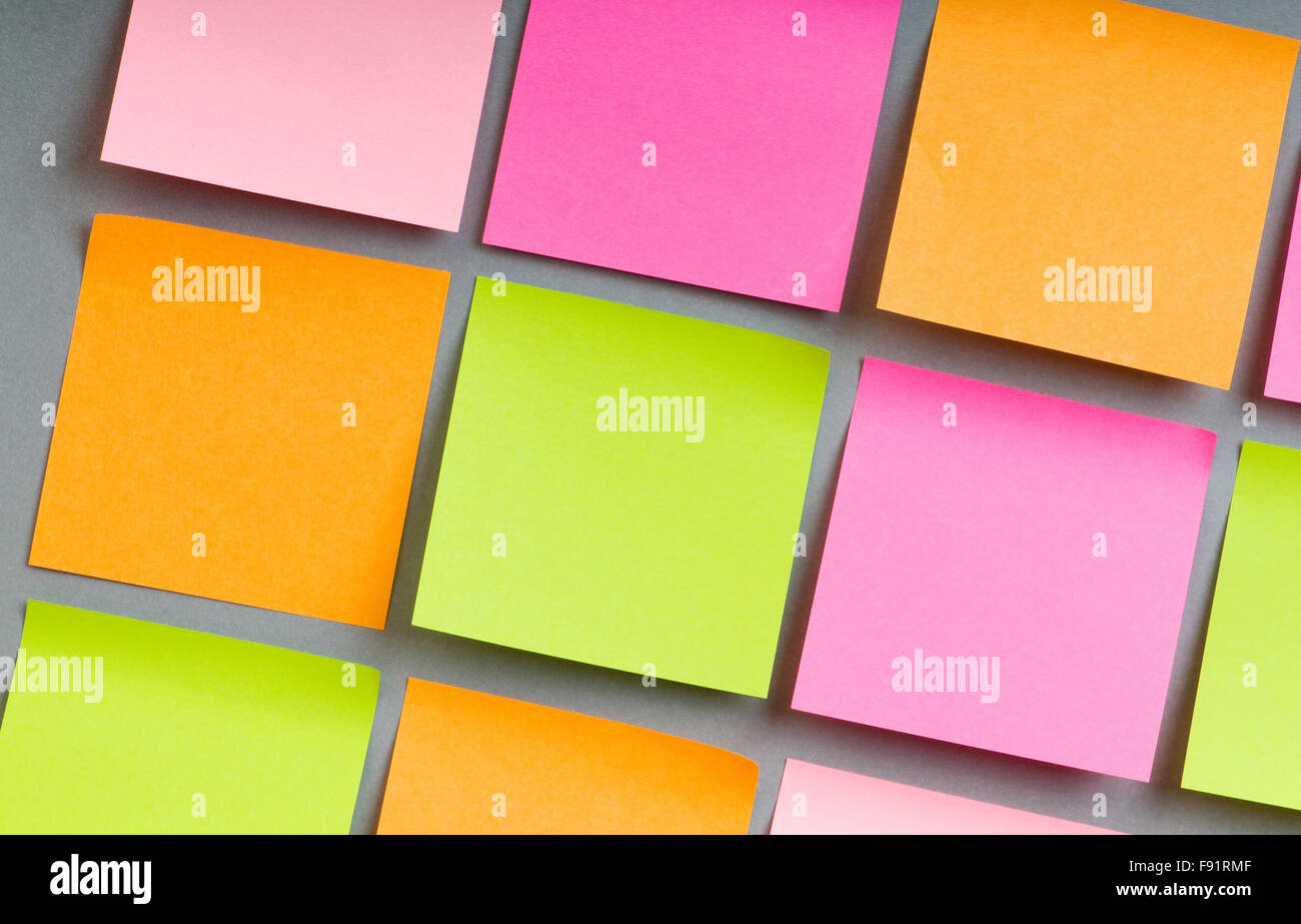 Reminder notes on the bright colorful paper Stock Photo - Alamy