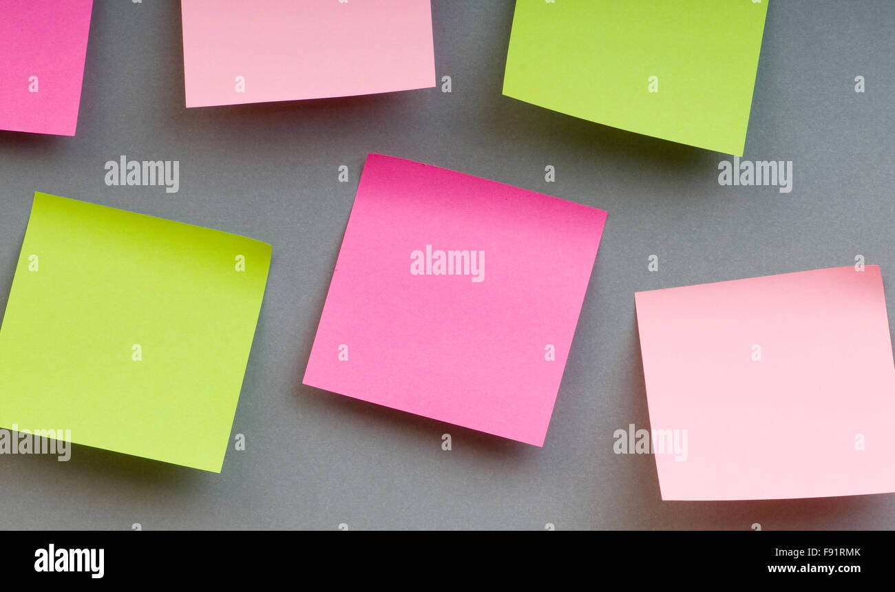 Reminder notes on the bright colorful paper Stock Photo - Alamy