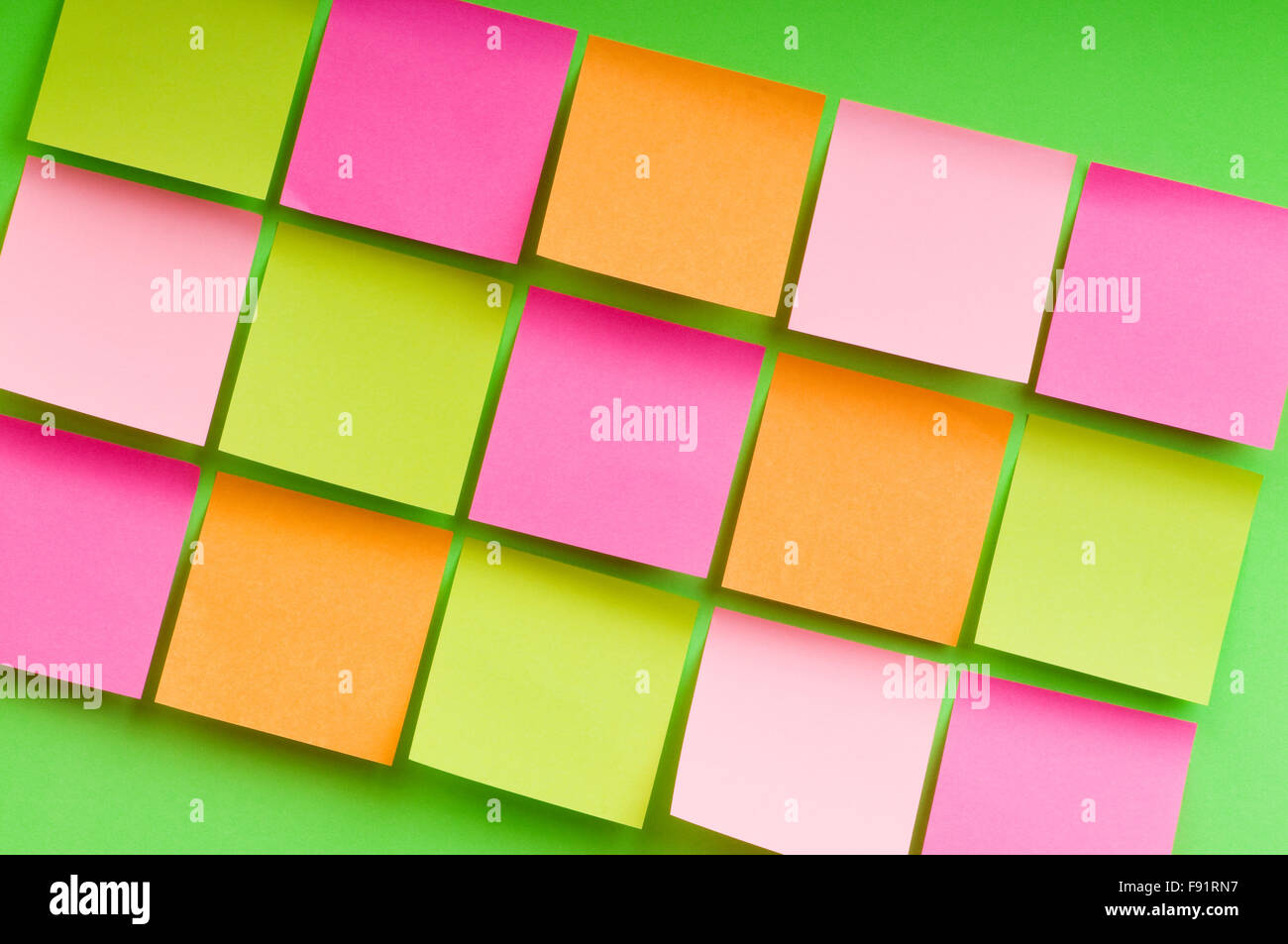 Reminder notes on the bright colorful paper Stock Photo - Alamy