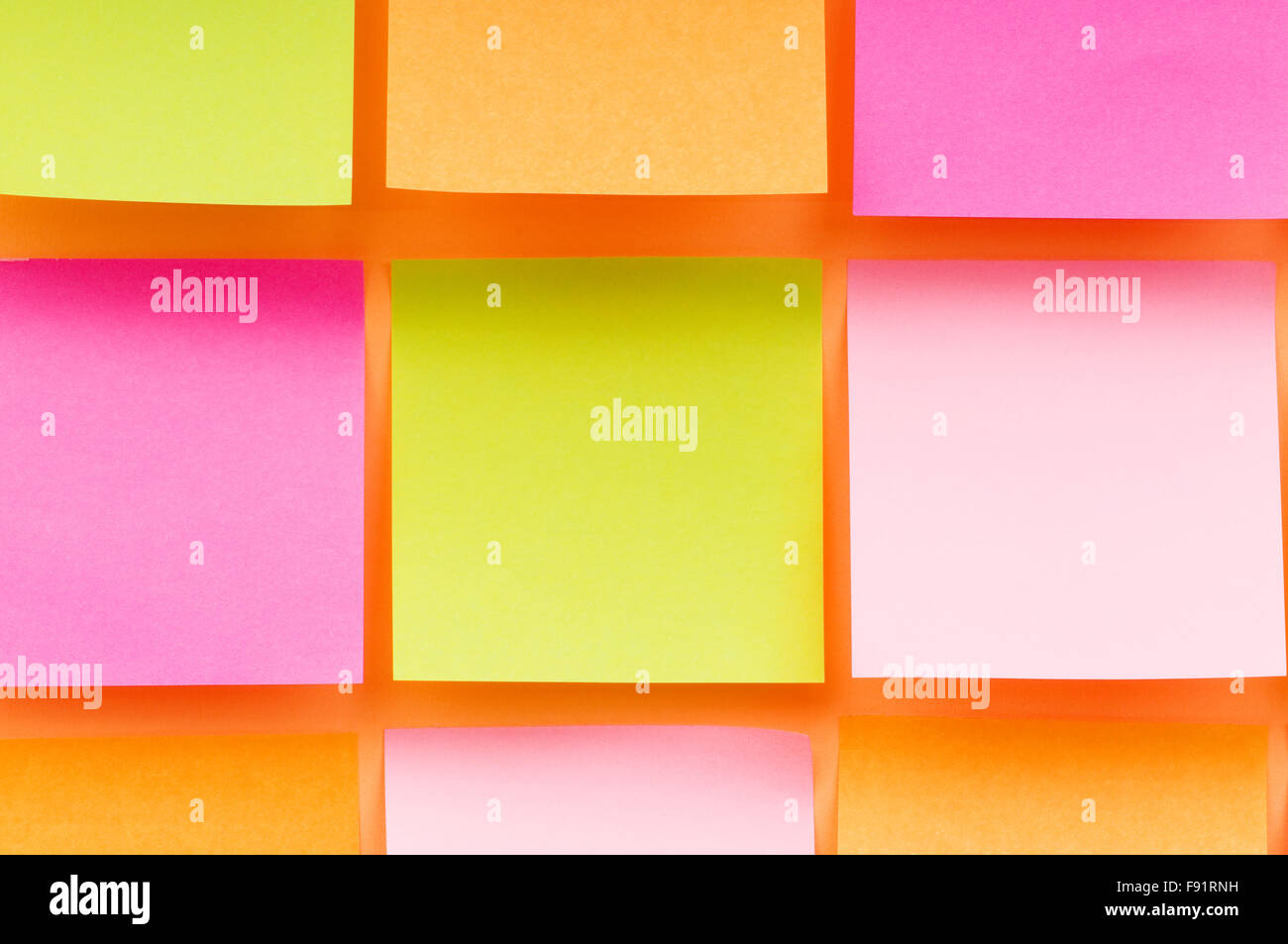 Reminder notes on the bright colorful paper Stock Photo - Alamy
